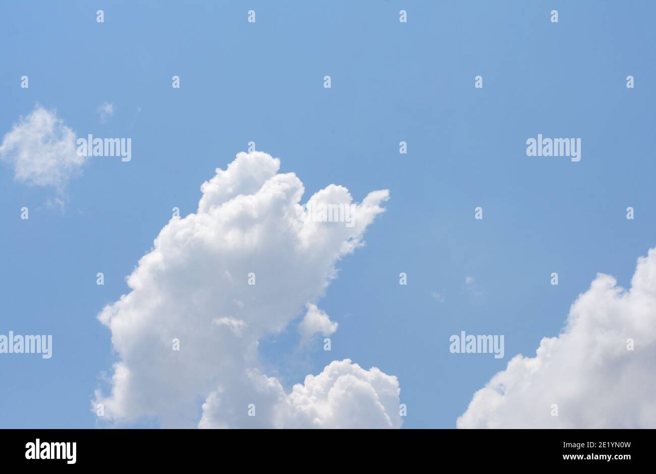 Sunny reflection background, blue sky with white clouds and sun. Blue ...