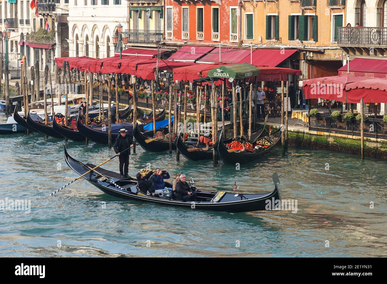 Venetian gondolas on the canal hi-res stock photography and images - Alamy