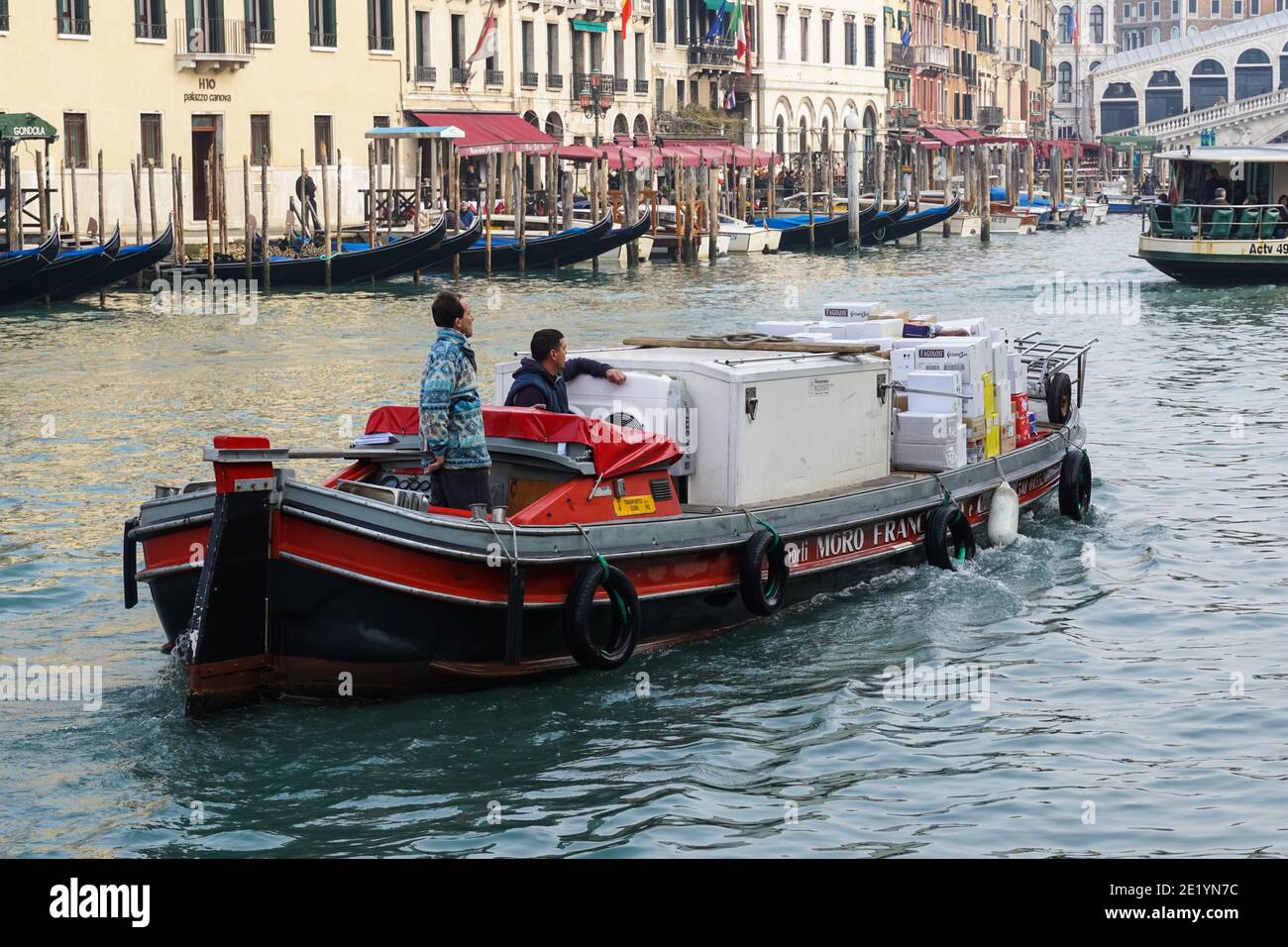 Cargo boat, cargo ship on Grand Canal in Venice, Italy Stock Photo - Alamy