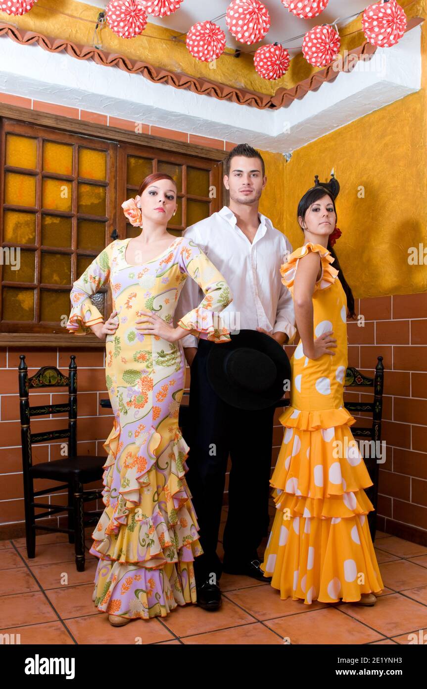 Spanish flamenco dancers during the Seville fair dancing sevillanas ...