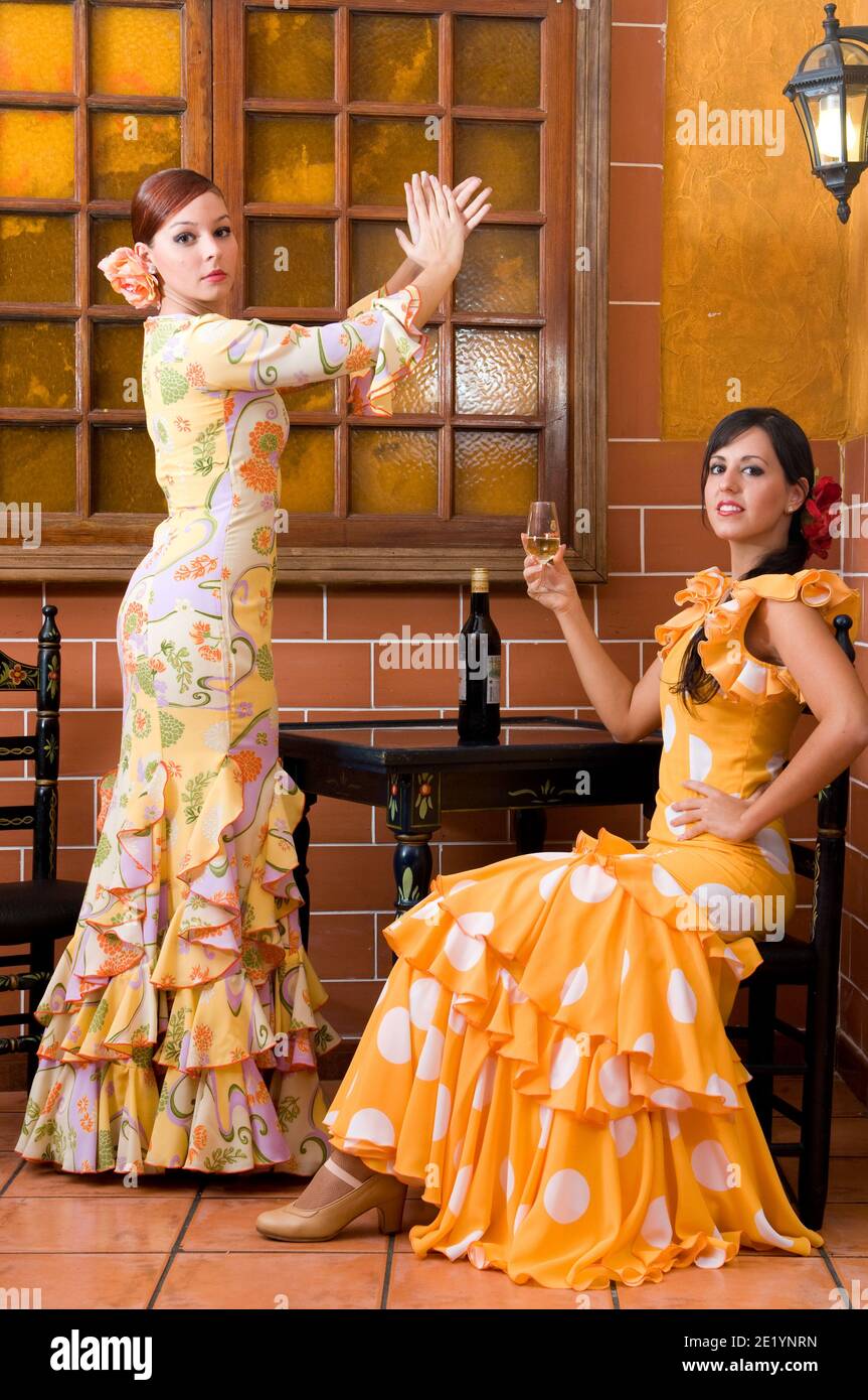 Spanish flamenco dancers during the Seville fair dancing sevillanas ...