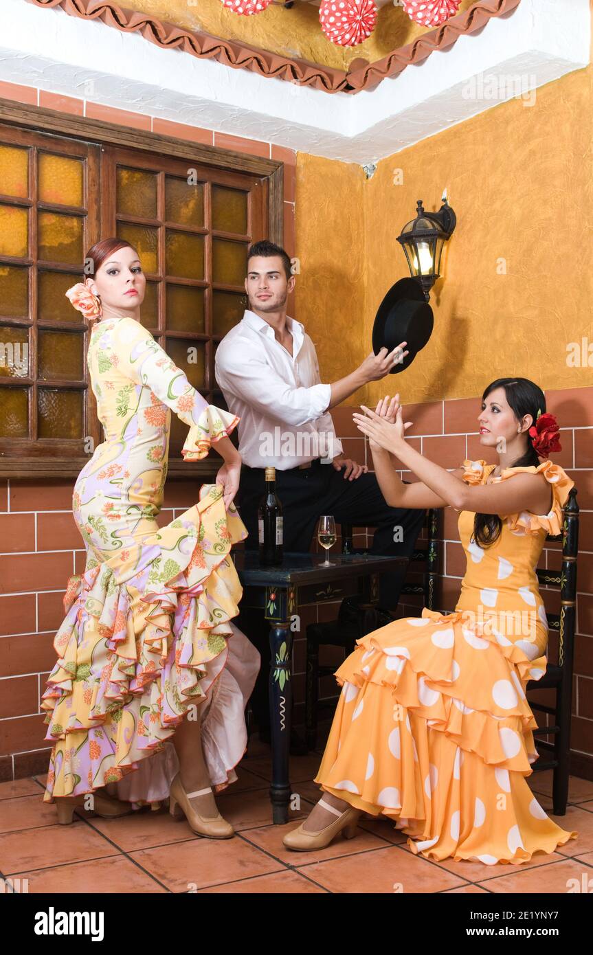 Spanish flamenco dancers during the Seville fair dancing sevillanas ...