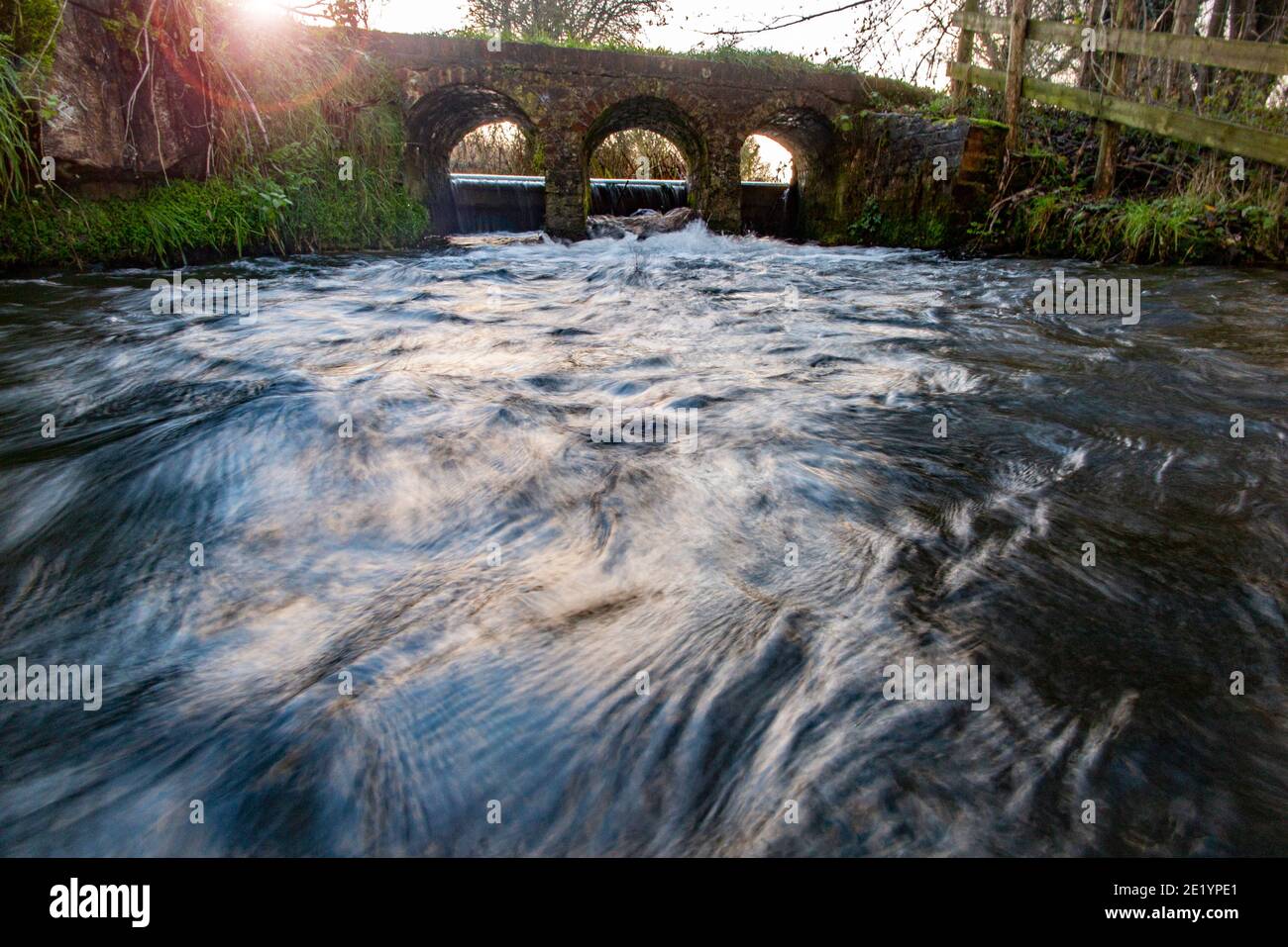 A small old brick foot bridge on the River Itchen in Hampshire Stock ...
