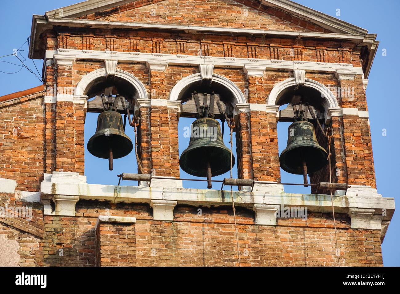 Three bells at the bell tower of the church in Venice, Italy Stock ...