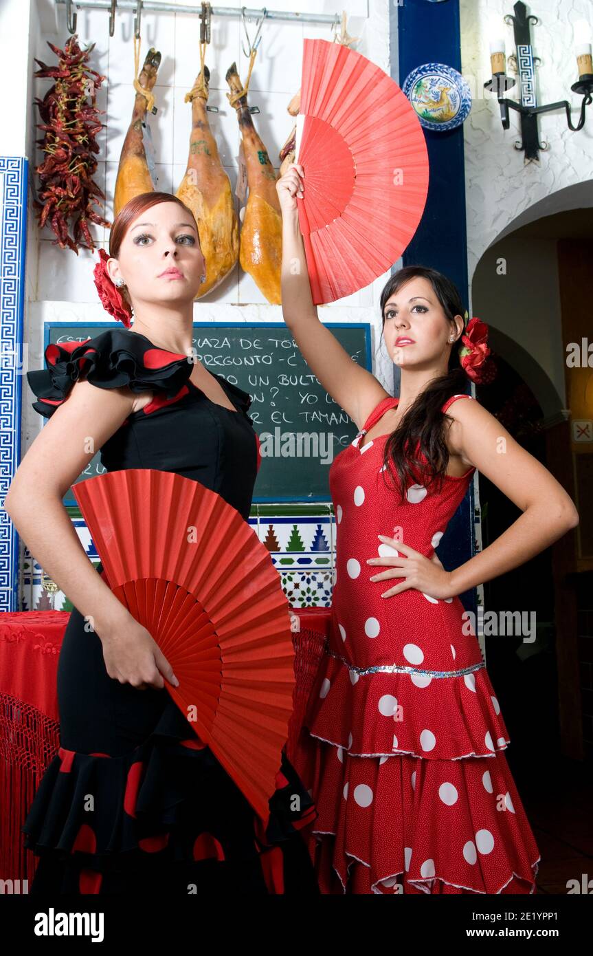 Spanish flamenco dancers during the Seville fair dancing sevillanas ...