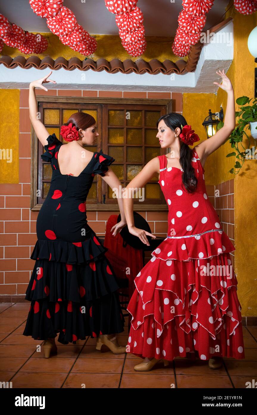 Spanish flamenco dancers during the Seville fair dancing sevillanas ...