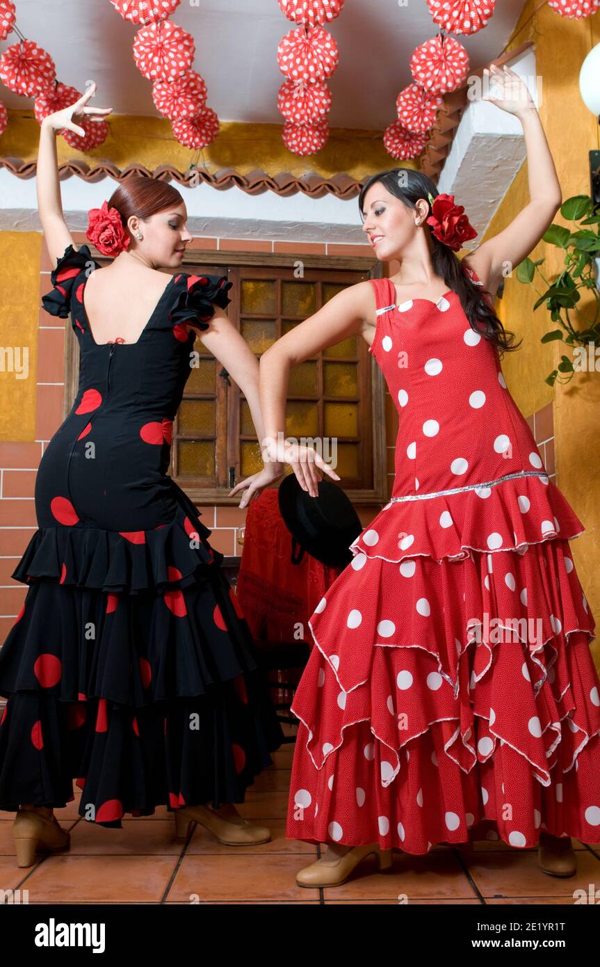 Spanish flamenco dancers during the Seville fair dancing sevillanas ...