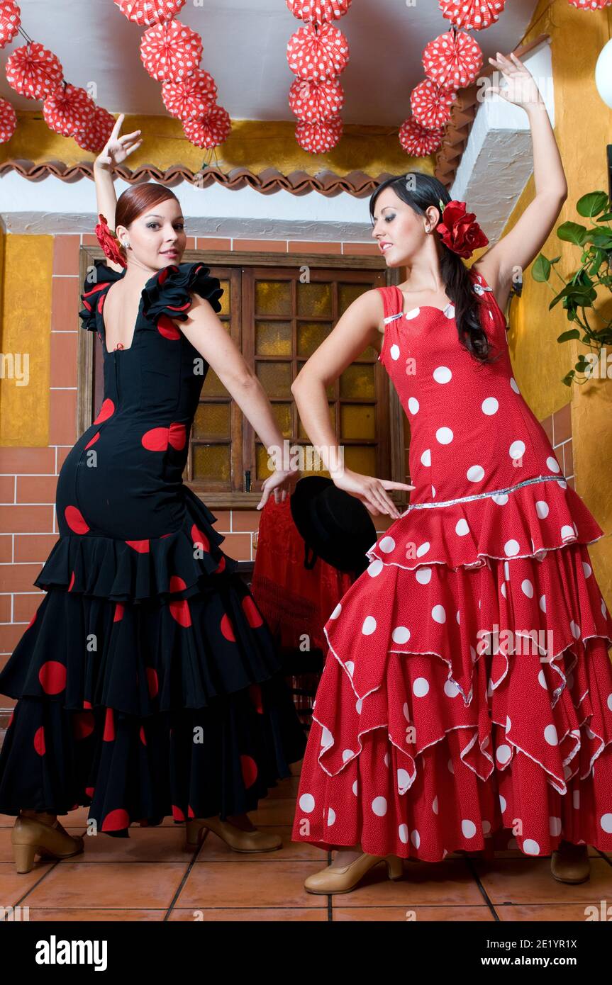 Spanish flamenco dancers during the Seville fair dancing sevillanas ...