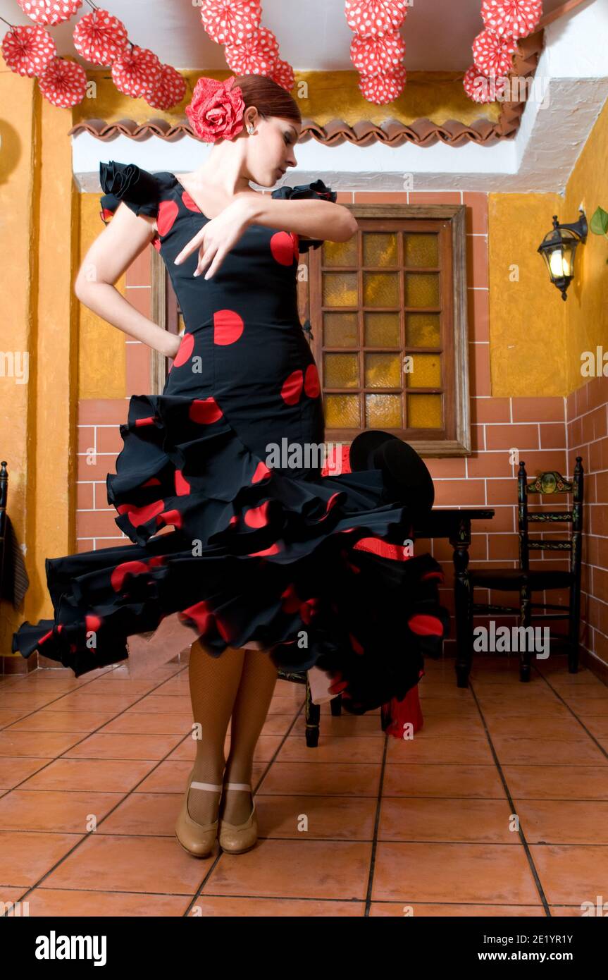 Spanish flamenco dancers during the Seville fair dancing sevillanas ...