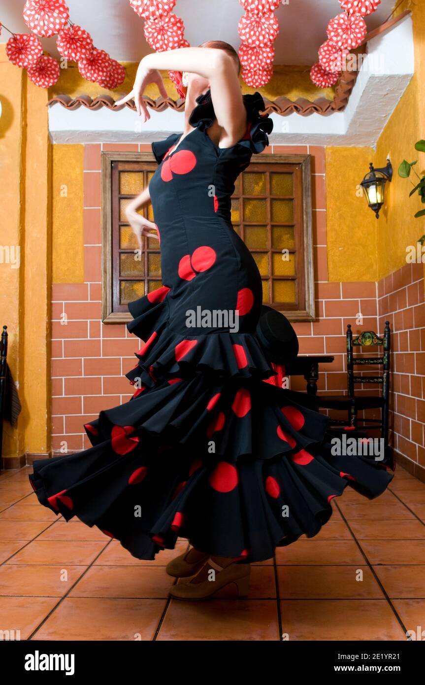 Spanish flamenco dancers during the Seville fair dancing sevillanas ...
