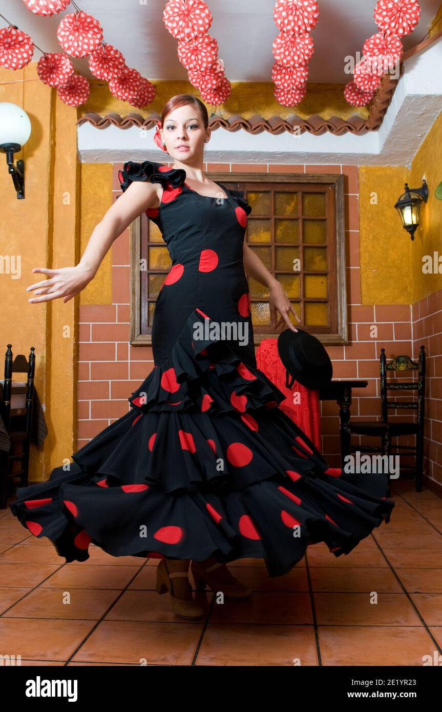 Spanish flamenco dancers during the Seville fair dancing sevillanas ...