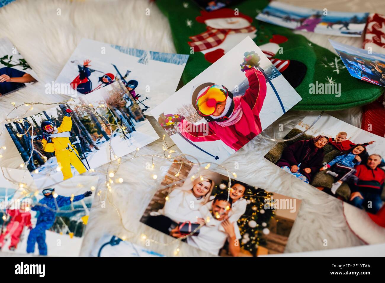 winter photos on the floor, Family Travel Photobooks, photo album Stock ...