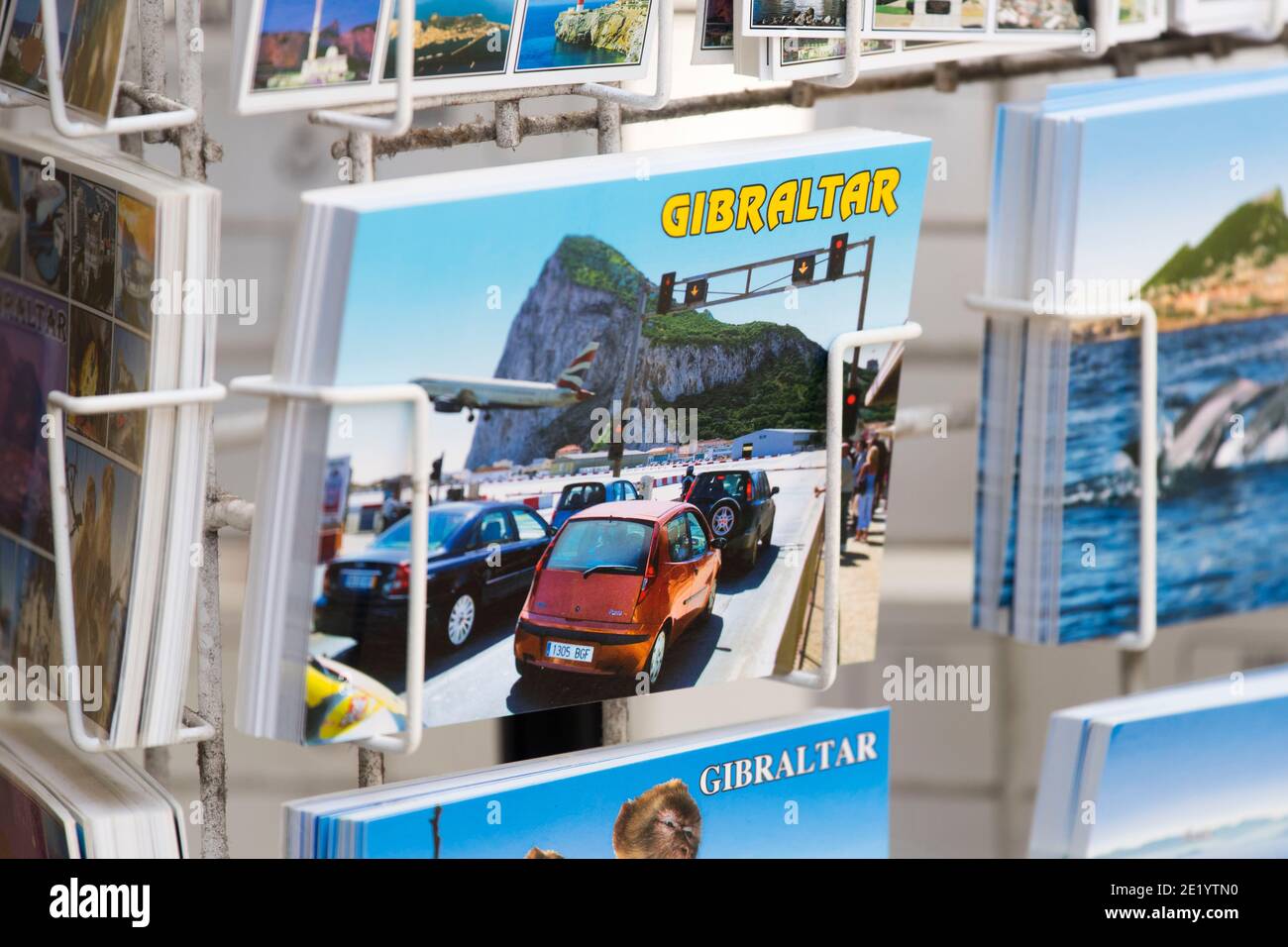 A close-up of a postcard showing the rock of Gibraltar at a shop in ...