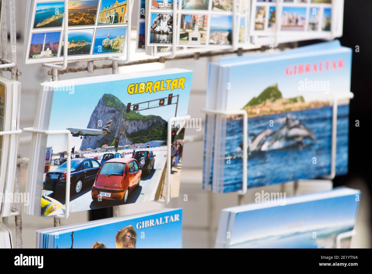 A close-up of a postcard showing the rock of Gibraltar at a shop in ...