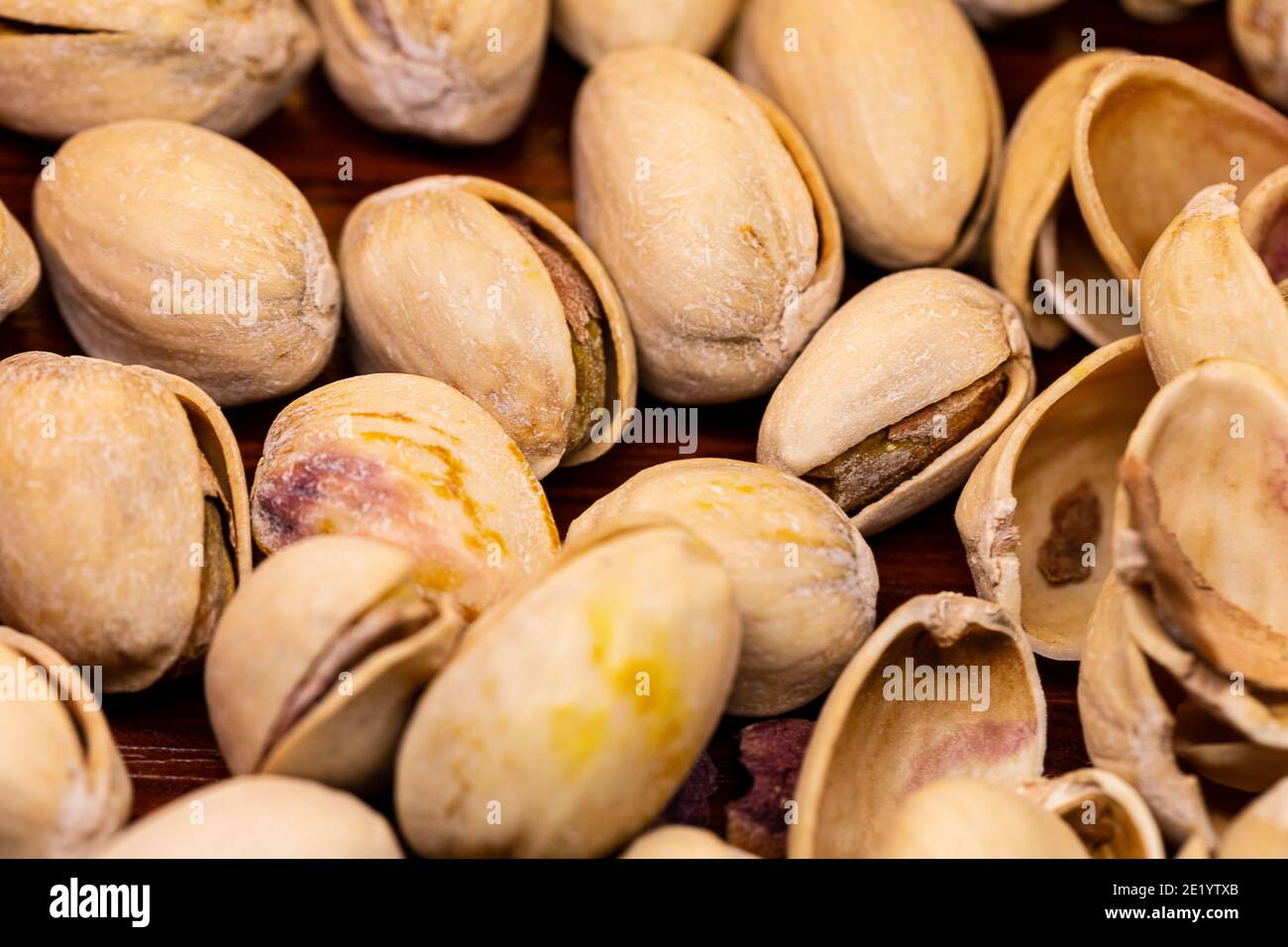 A close-up shot of roasted Pistachios ready to be eaten as a snack or ...