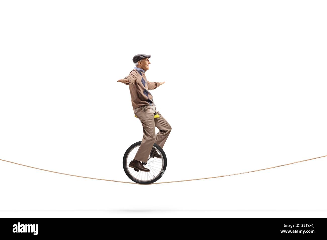 Energetic elderly man riding Cut Out Stock Images & Pictures - Alamy