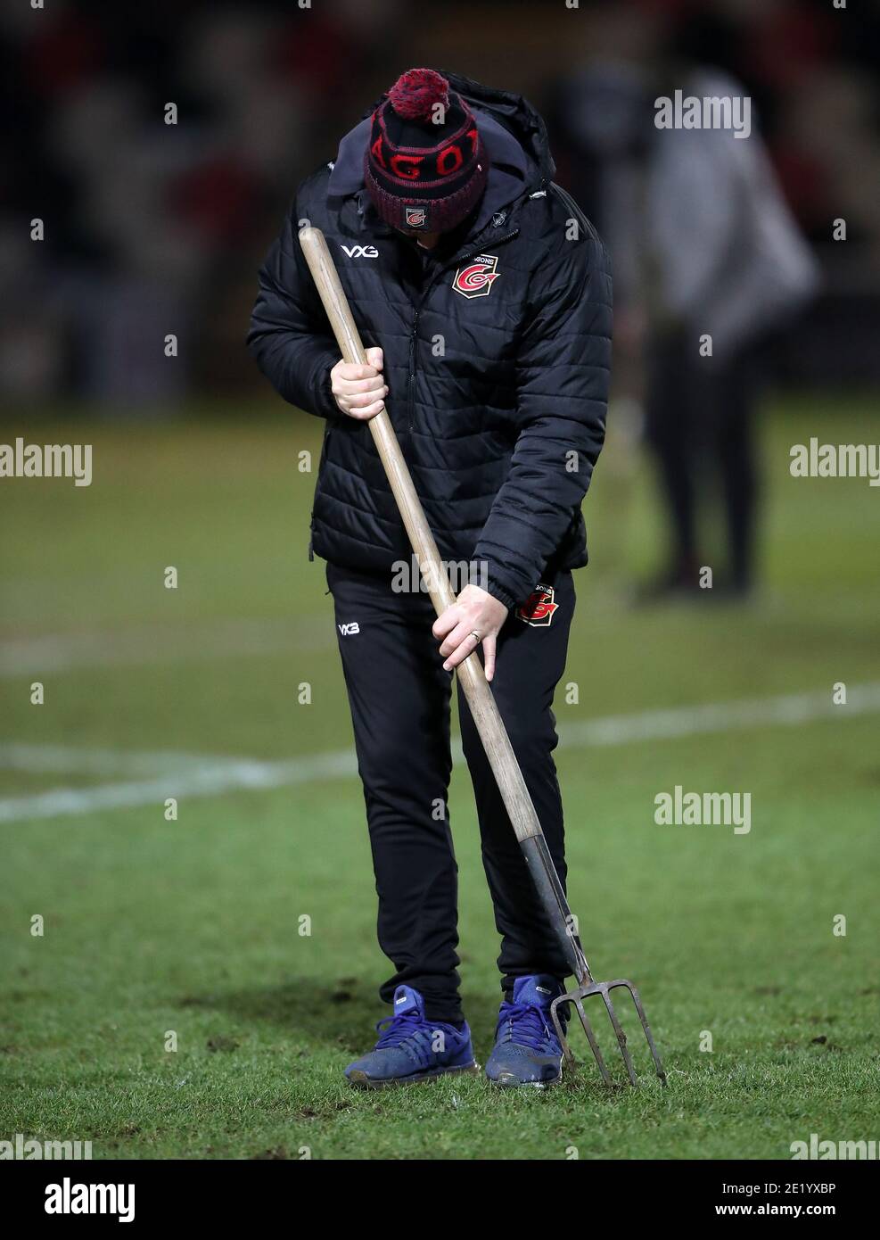 Ground-staff attend to the pitch at half time during the Emirates FA ...