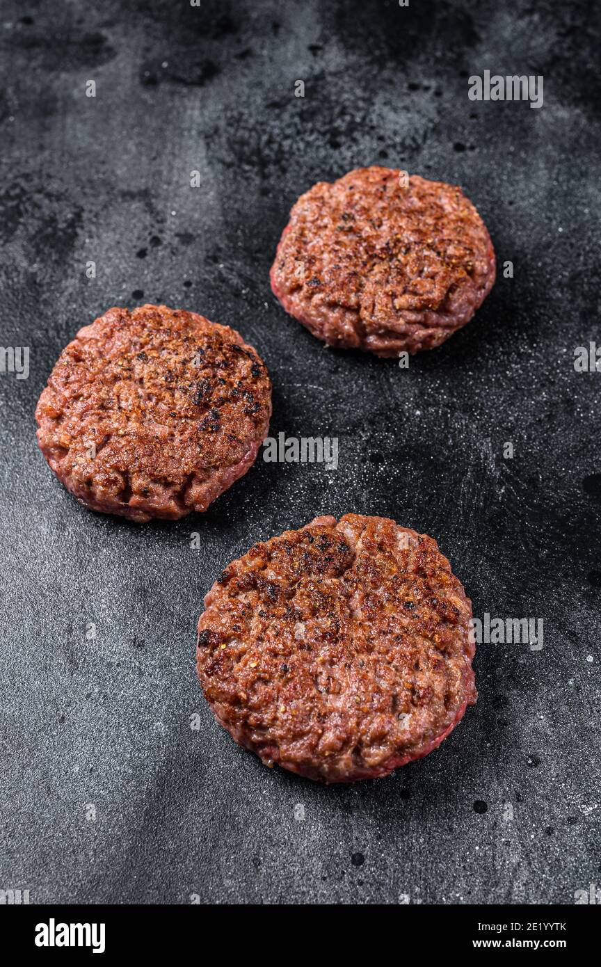 Grilled ground beef steak patties for burgers, Mince meat. Black ...