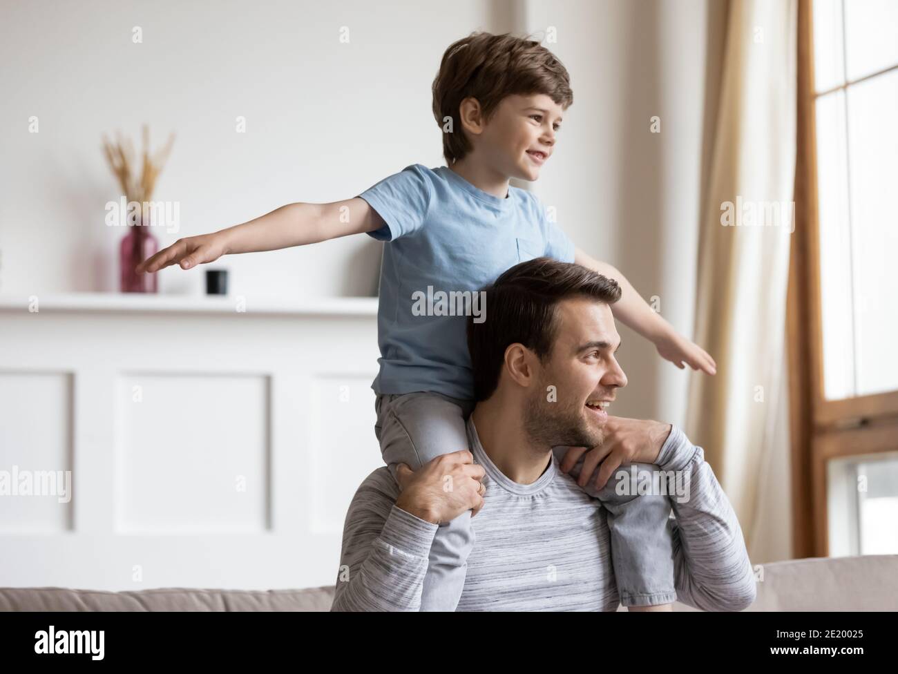 Happy father have fun at home with little son Stock Photo - Alamy
