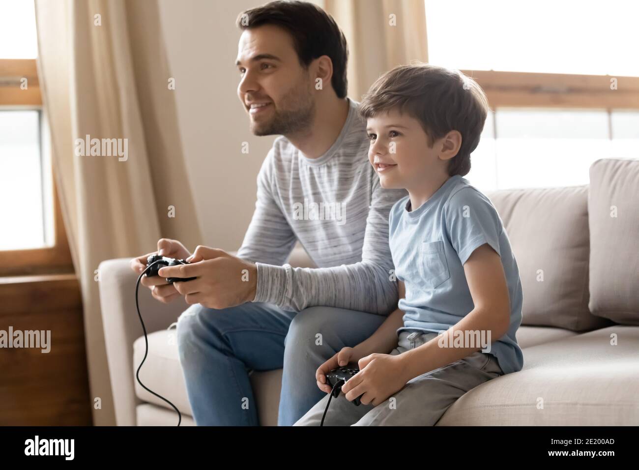 Child father player smile son hi-res stock photography and images - Alamy
