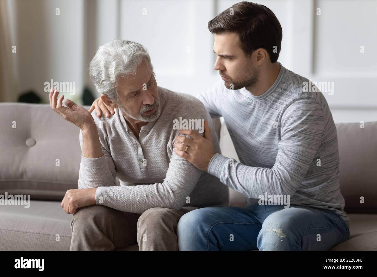 Adult son dad sad hi-res stock photography and images - Alamy