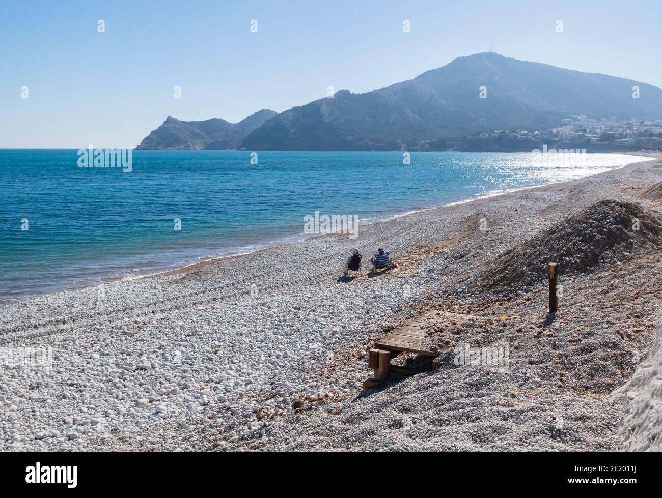 People sitting destroyed beach hi-res stock photography and images - Alamy