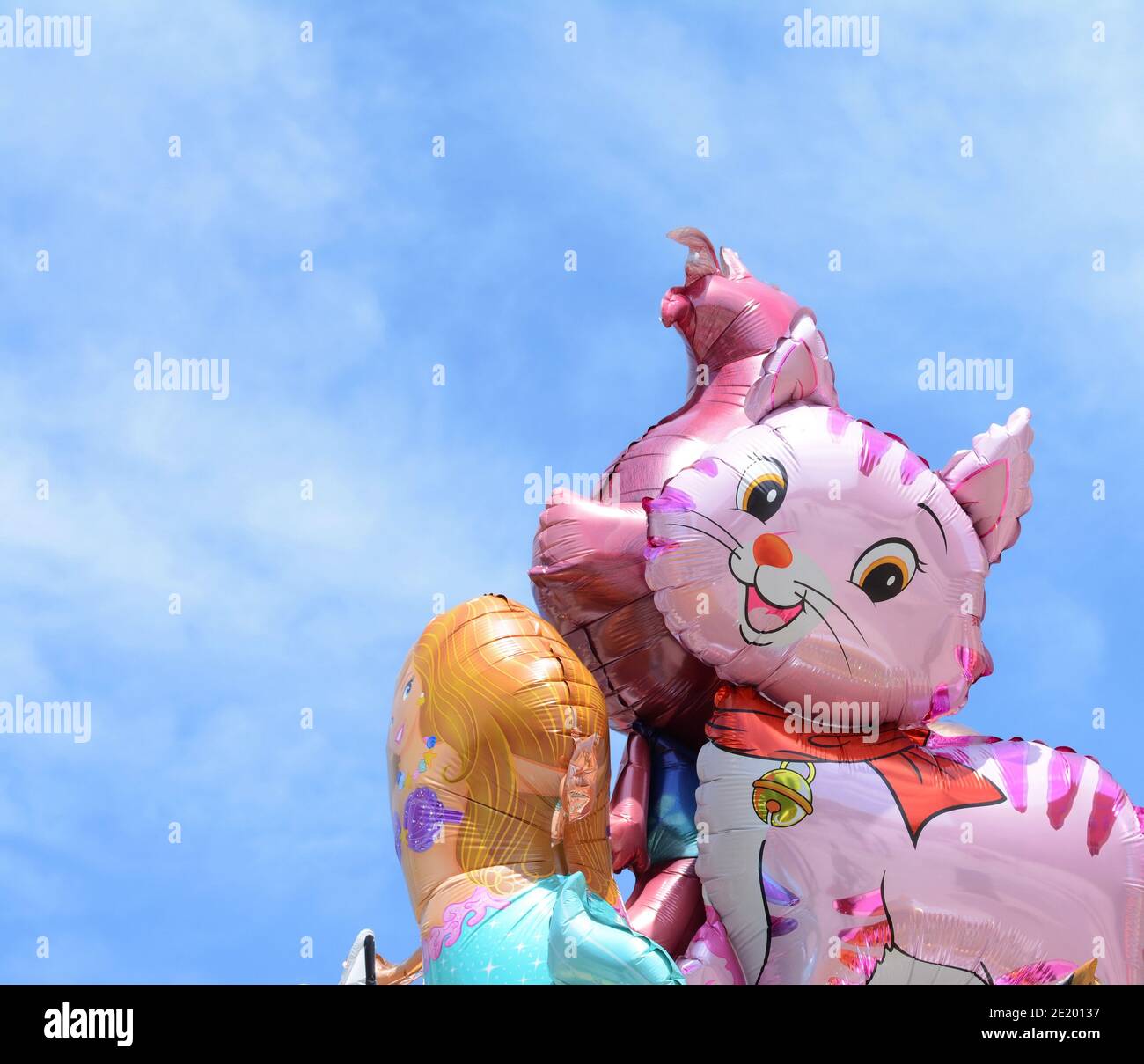 Fair. Balloons for kids with the shapes of cartoon characters Stock ...