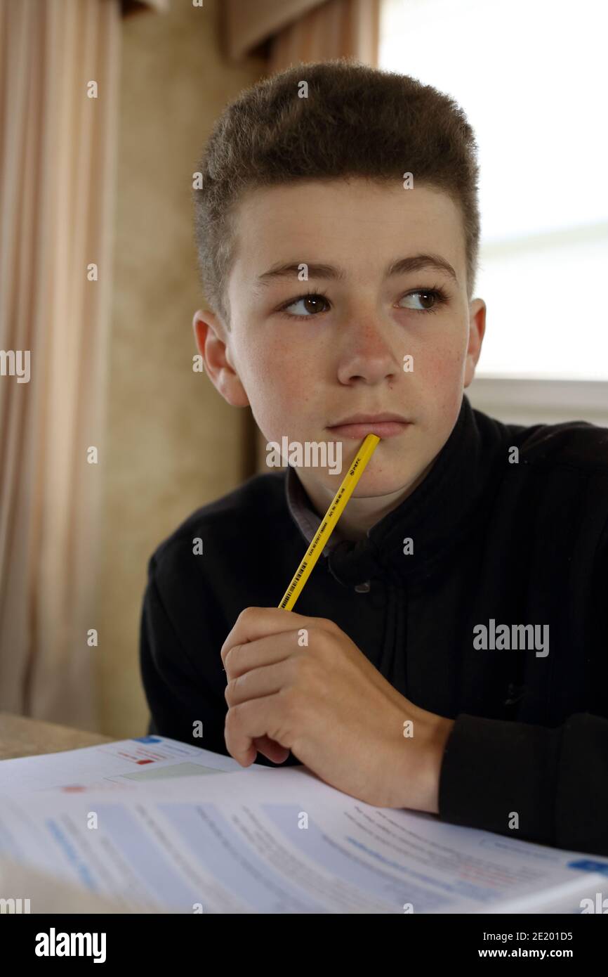 Chewing pencil hi-res stock photography and images - Alamy