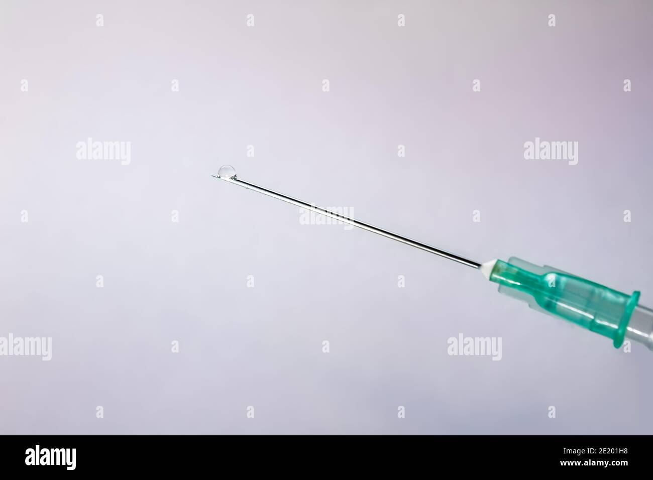 Needle on a white background Stock Photo - Alamy
