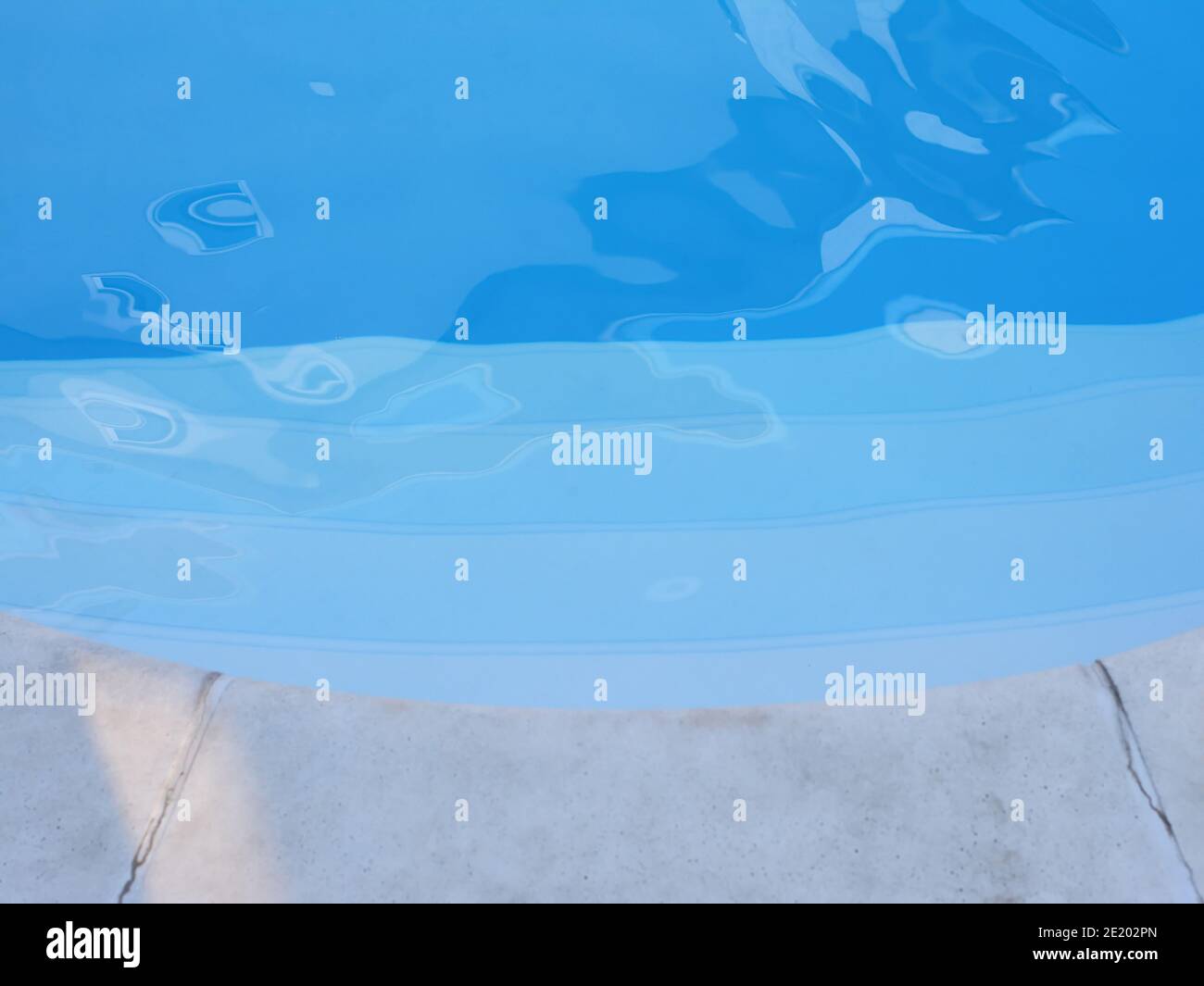 Surface of blue swimming pool,background of water in swimming pool ...