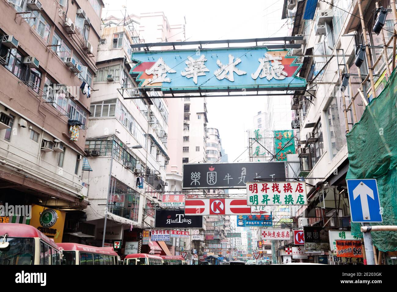Hanging Signs on a Busy Street Stock Photo - Alamy