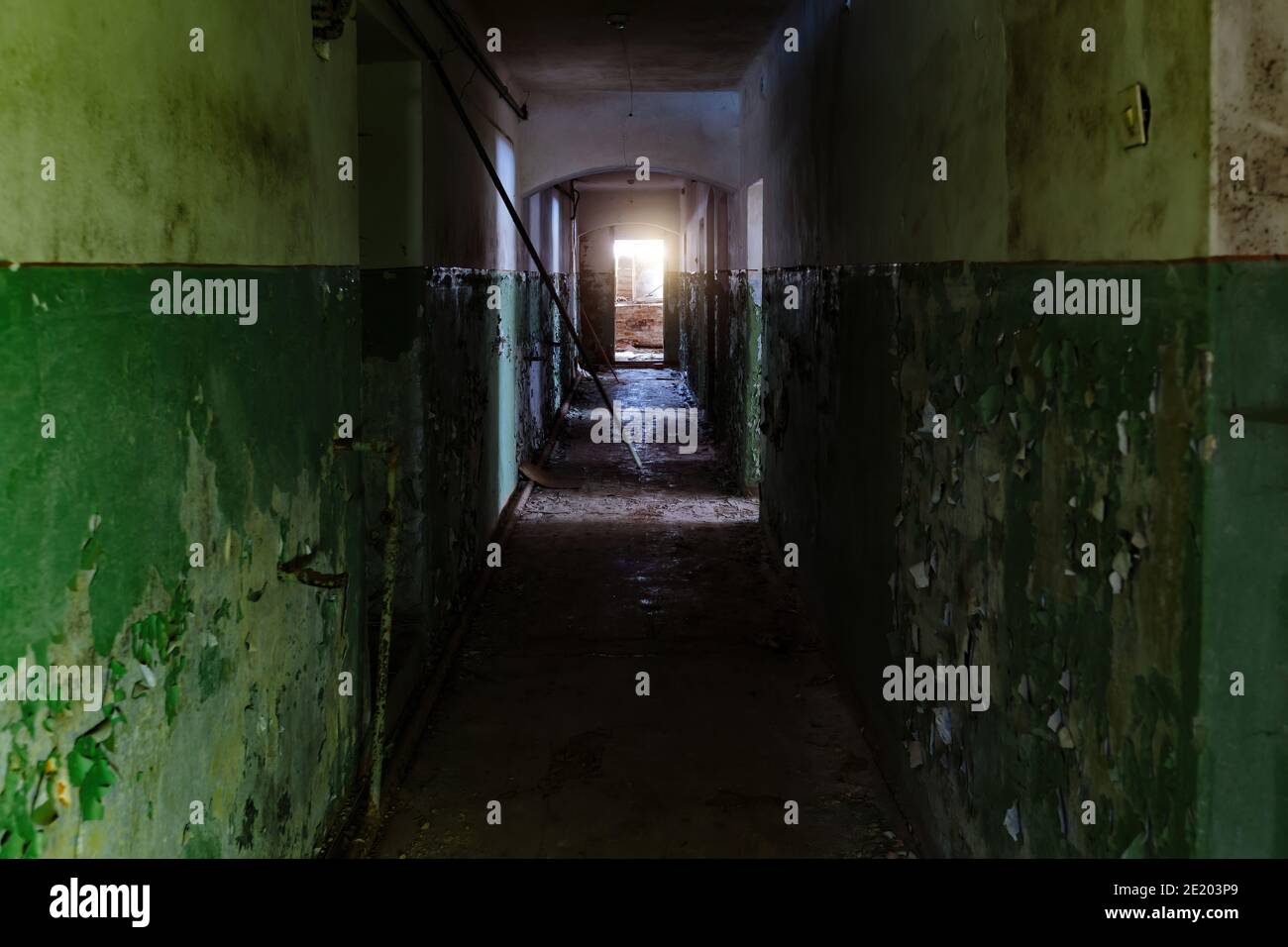 Dark dirty corridor of old abandoned building Stock Photo - Alamy