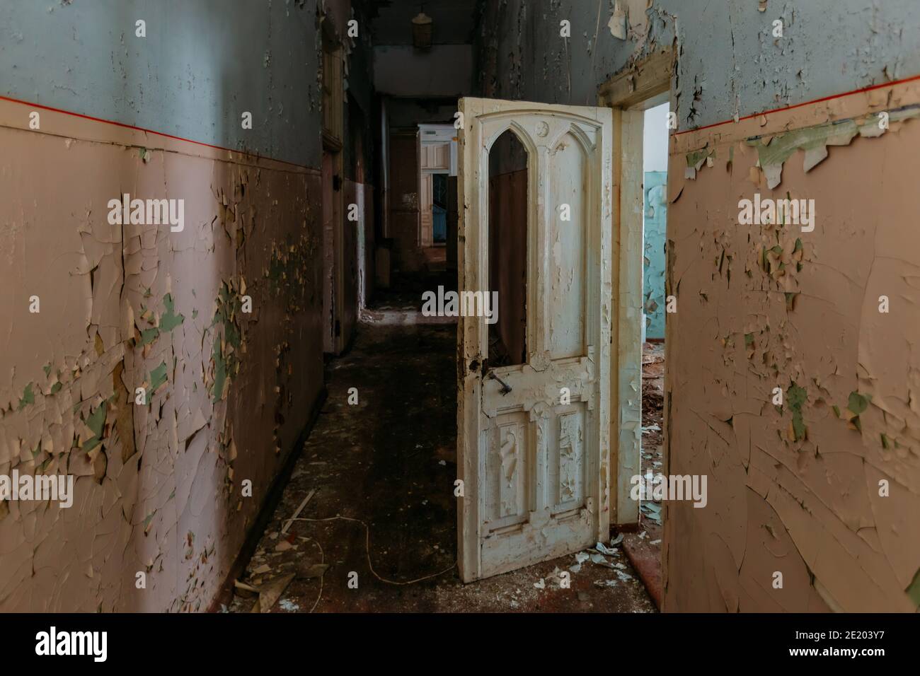 Dark dirty corridor of old abandoned building Stock Photo - Alamy