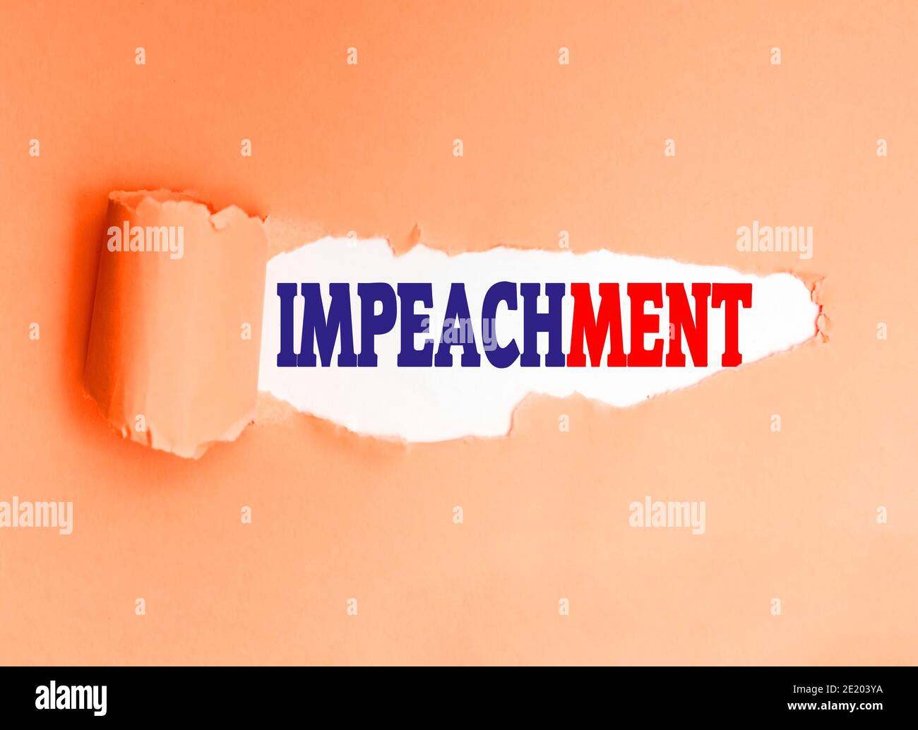 English word impeachment written on a torn paper Stock Photo - Alamy