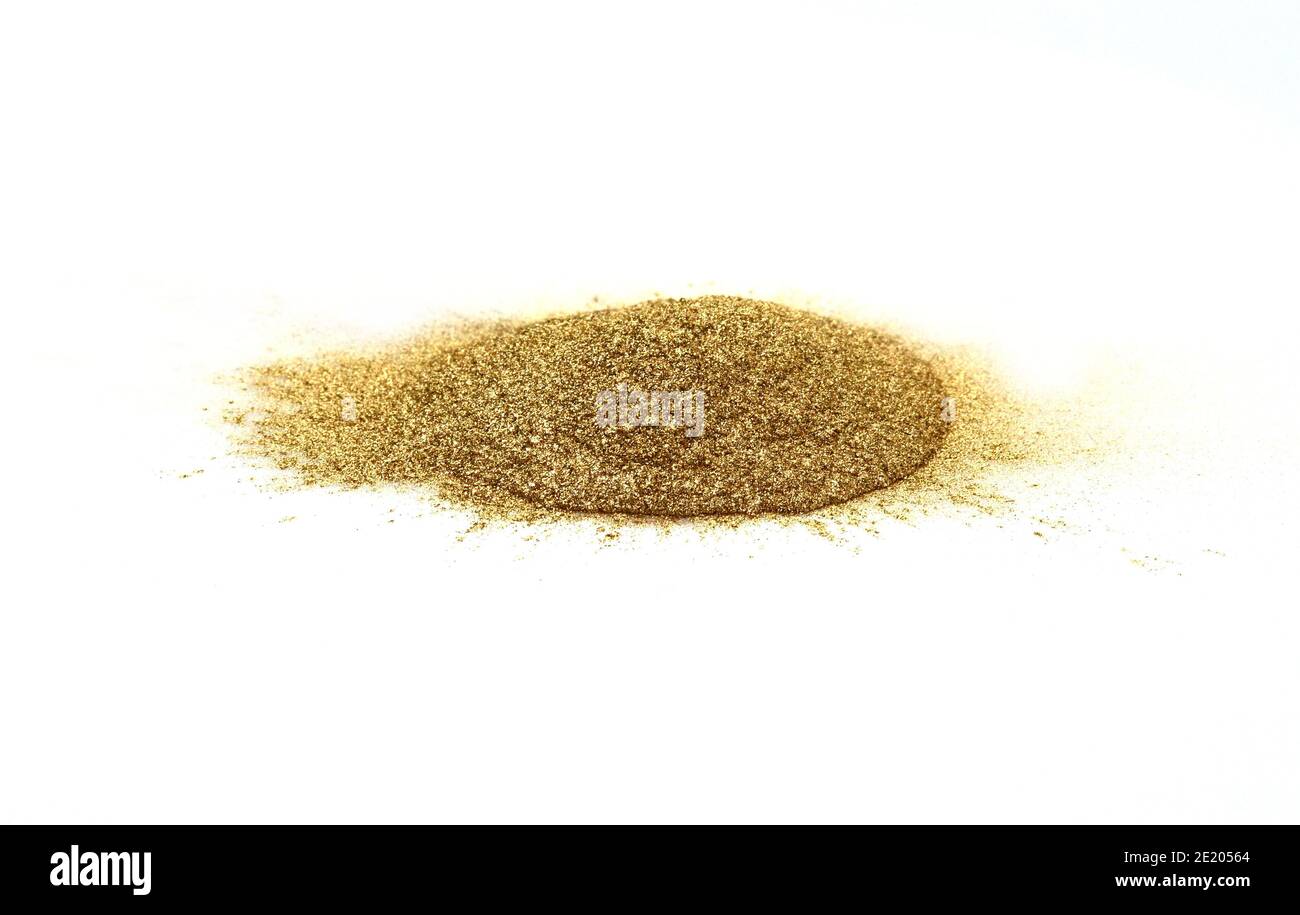 gold glitter powder on white background Stock Photo - Alamy