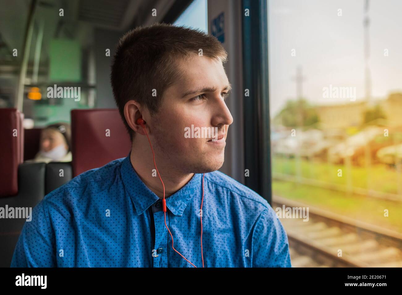 Commuter headphones train hi-res stock photography and images - Alamy