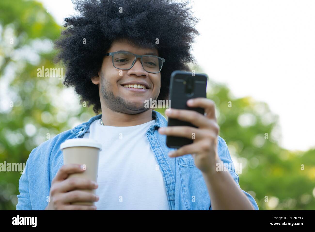 Young man mobile phone hi-res stock photography and images - Alamy