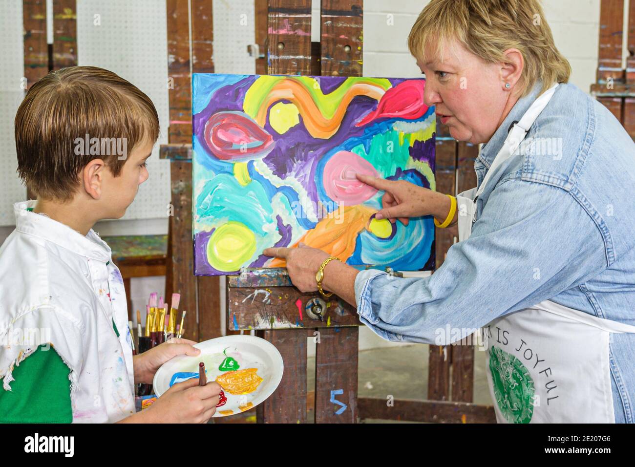 Community gallery class boy woman female teacher artist painting hi-res ...