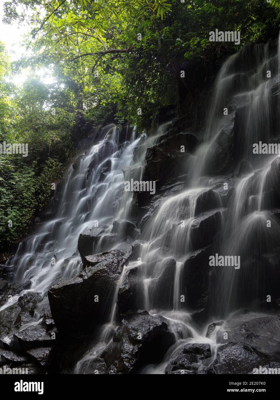 Long exposure panorama of tropical Air Terjun Kanto Lampo waterfall ...