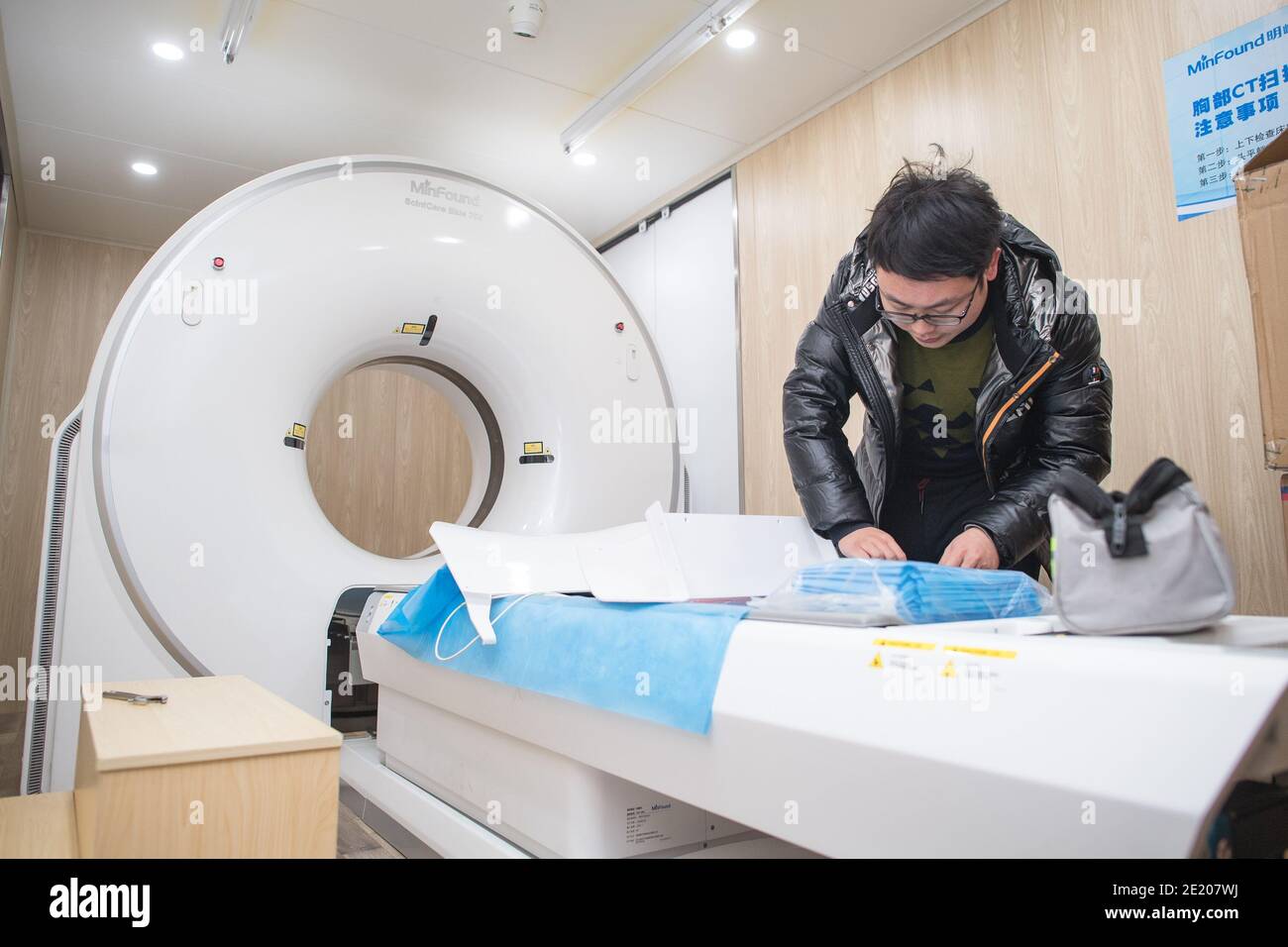 (210111) -- WUHAN, Jan. 11, 2021 (Xinhua) -- A staff member tests a ...