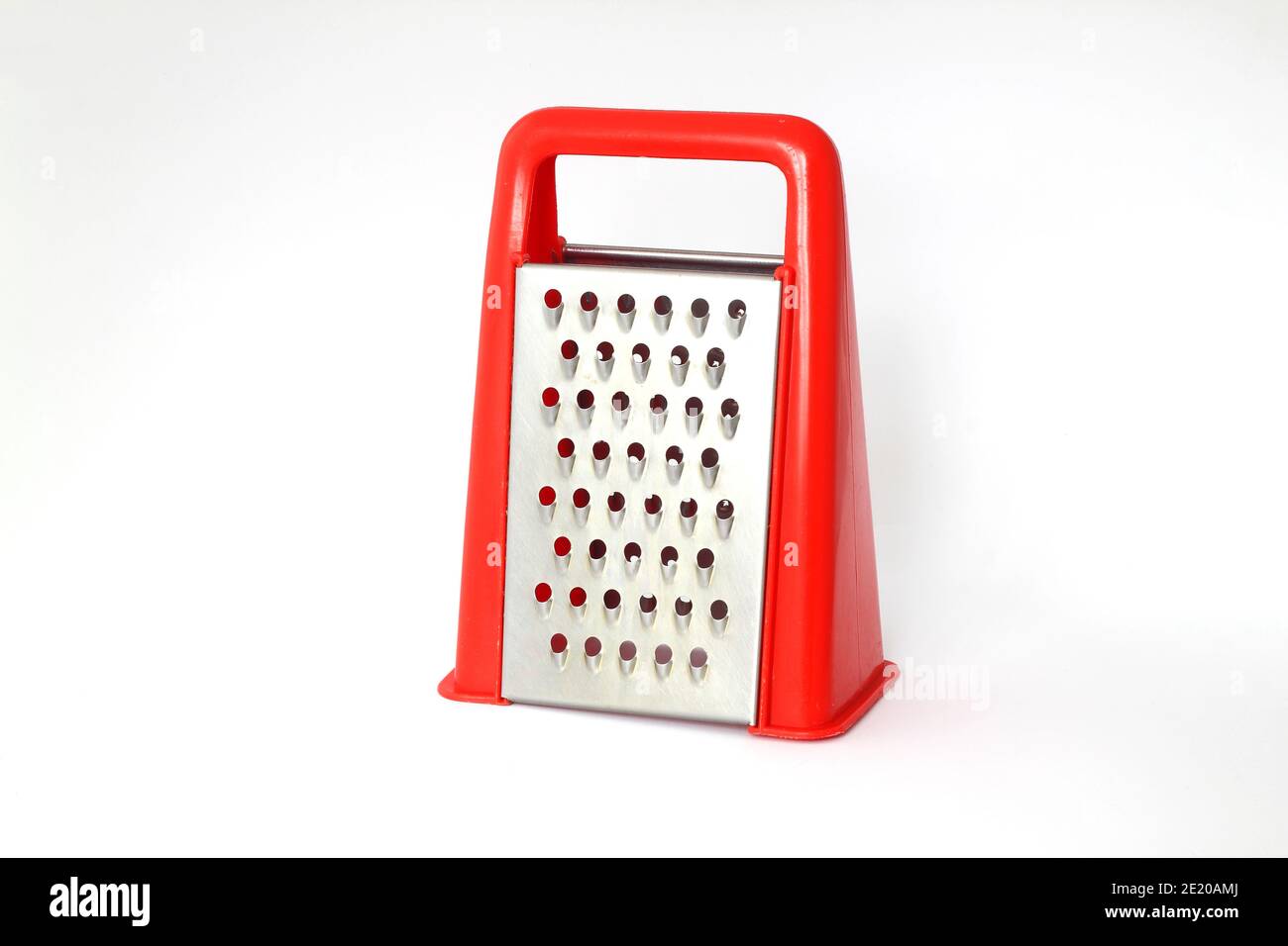 Red grater stainless steel closeup isolated on white background Stock ...