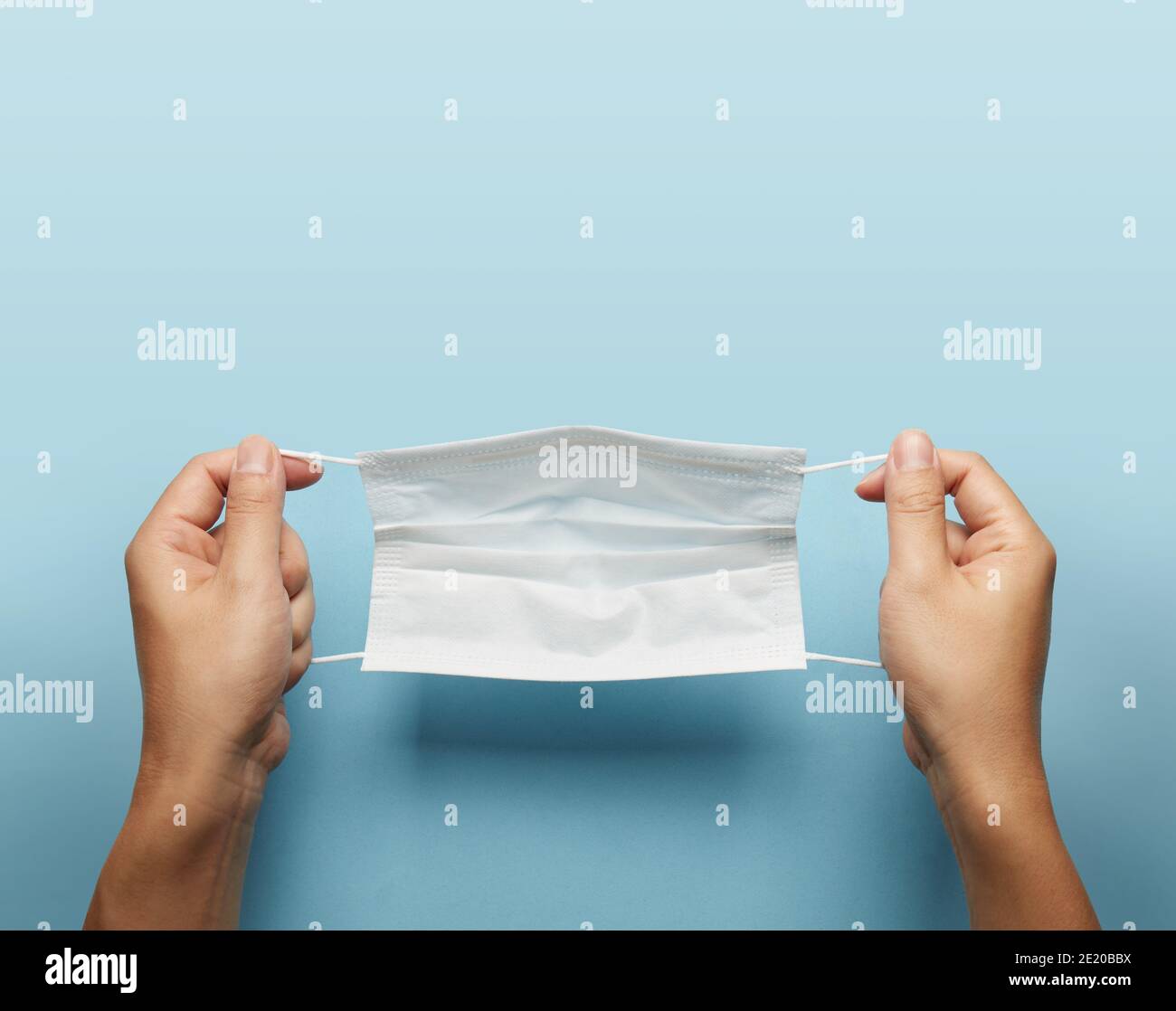 Holding mask over his face hi-res stock photography and images - Alamy