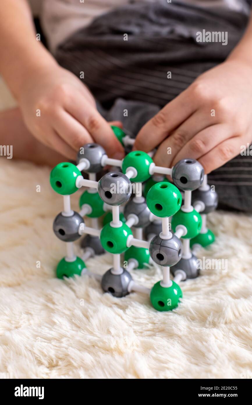 The boy collects from the constructor a model of the molecule of sodium ...