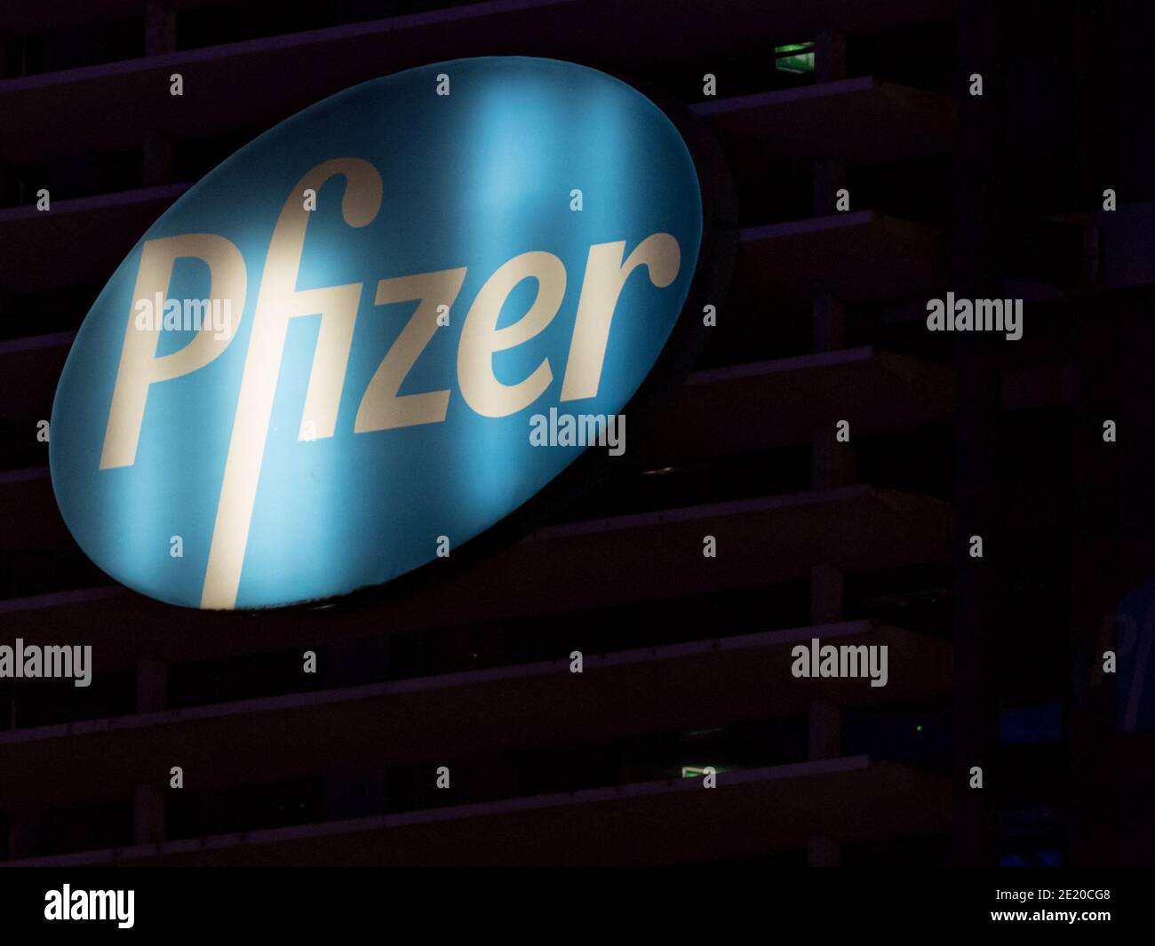 A view of Pfizer logo outside its headquarters in Montrouge, near Paris ...