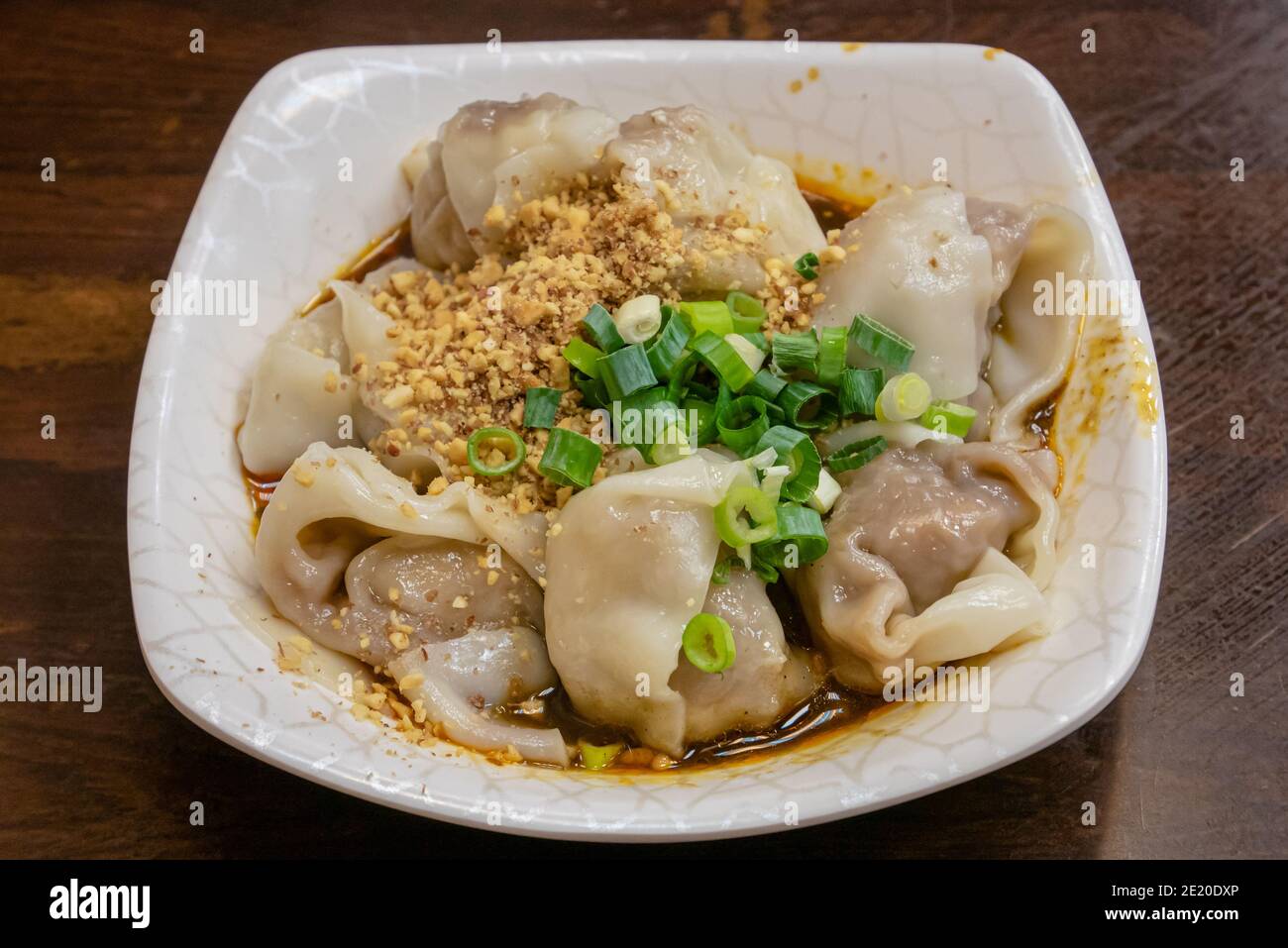 The close up of Taiwanese traditional steamed spicy stinky tofu wontons ...