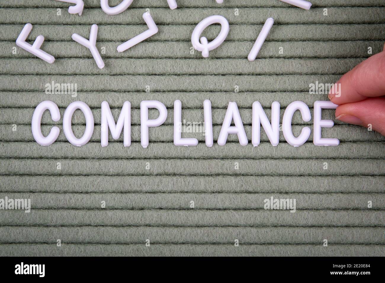 Compliance. Business concept. White letters of the alphabet with a ...