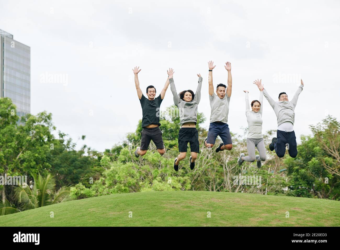 Jumping excited people Stock Photo - Alamy