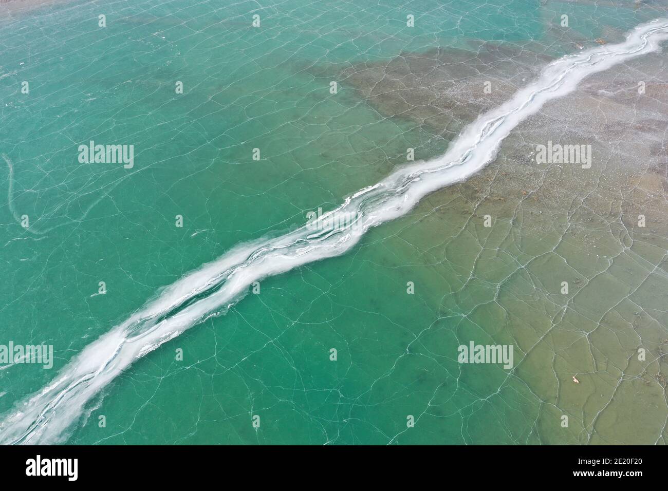 Bayingolin, China. 10th Jan, 2021. The beautiful green lake in the ...