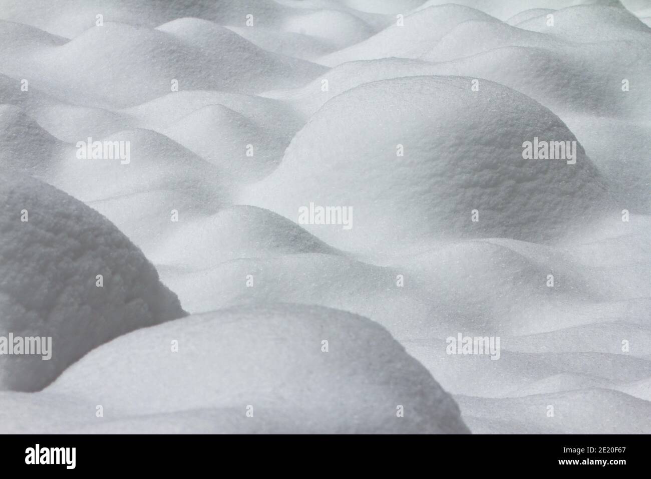 Abstract white snow forms and shapes pattern Stock Photo - Alamy