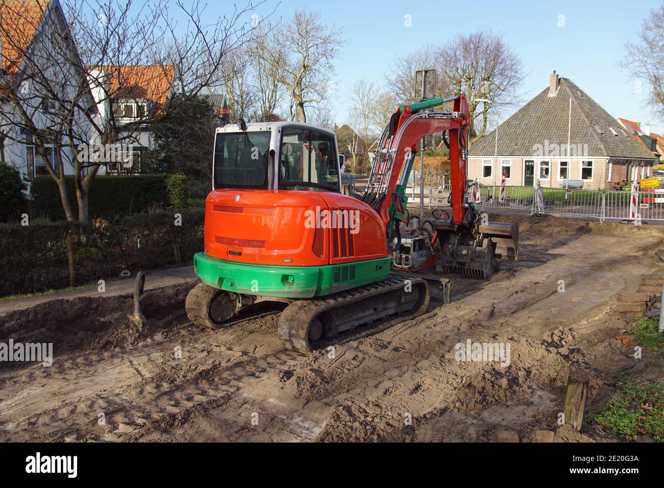 Green excavator hi-res stock photography and images - Alamy